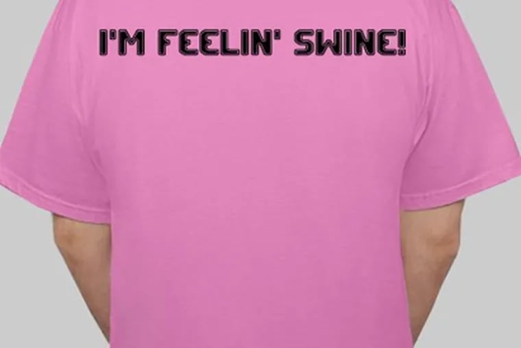 'Swine '09' shirts catch on with students