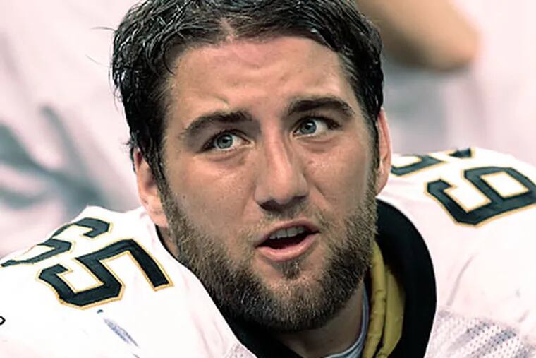 Eagles sign center Matt Tennant, cut Steve Vallos