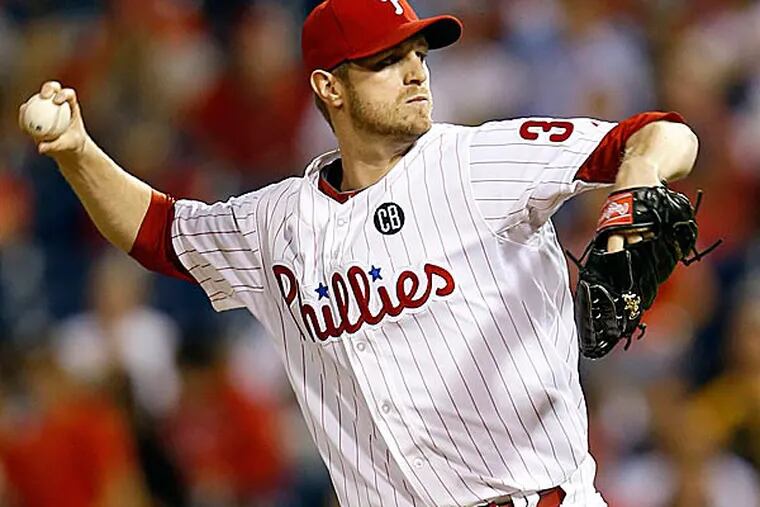 Hamstring pulls Rollins off the field in Phllies' loss