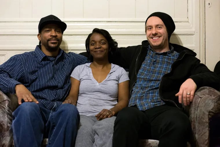 A portrait of a family and a window into the city