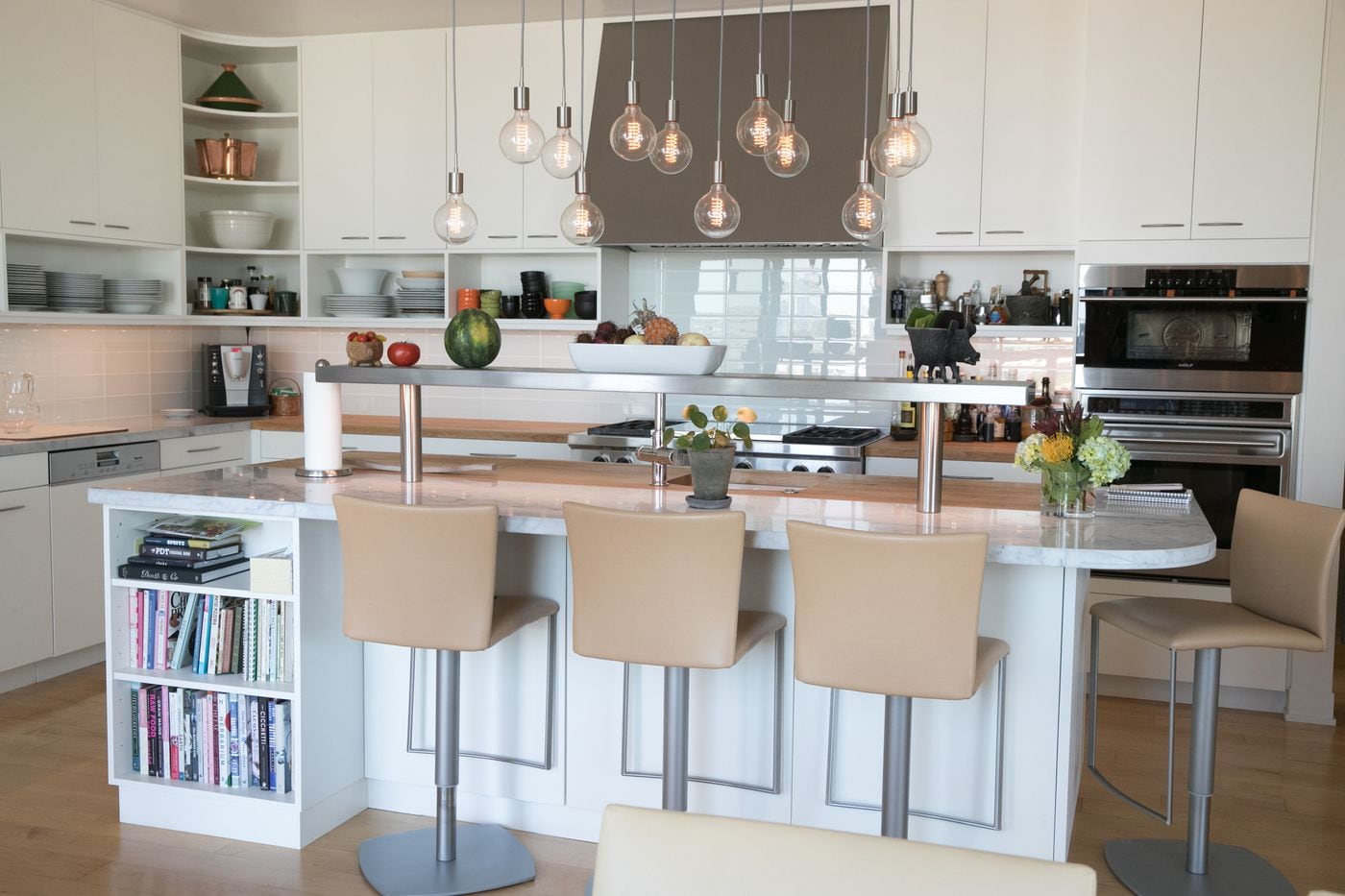 Kitchen islands create a hub for cooking, dining, entertaining and ...