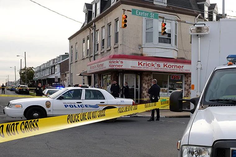 Shooting of two robbers shakes a street, and a city