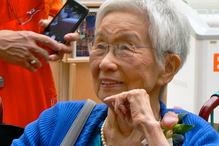 Yuriko Moriuchi, 97, a teacher of Japanese flower arranging
