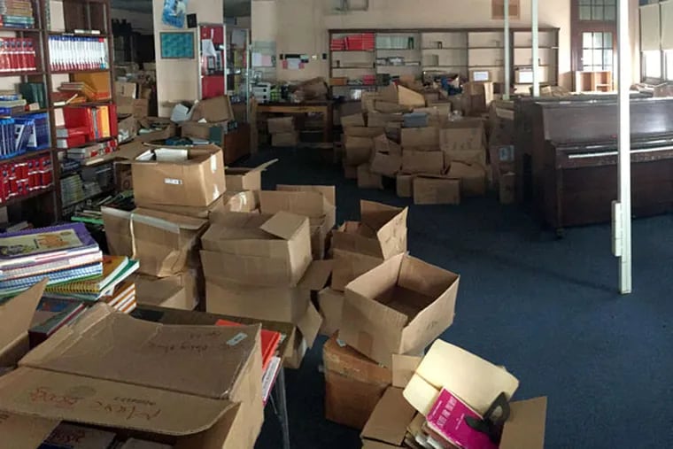 Amid the stacks of textbooks, aiming to turn the page