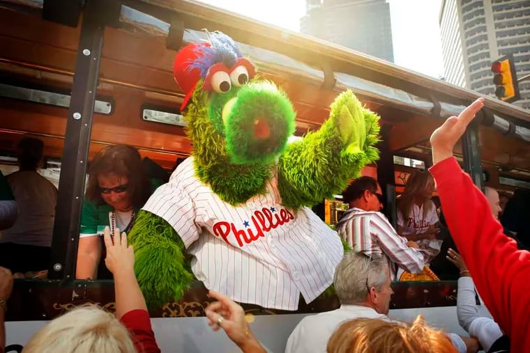 Phillies fans cheer Rally Trolley in Center City