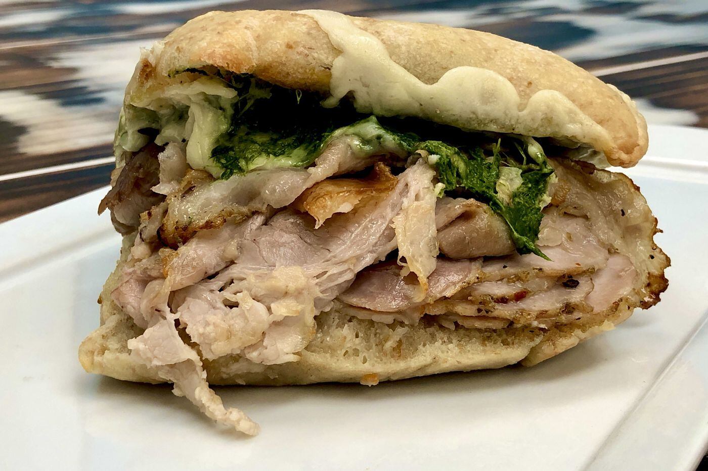 Pastries meet porchetta: Small Oven Pastry Shop and Porcos open side by ...