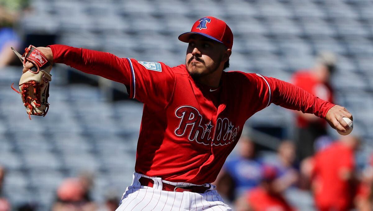Phillies stockpile arms by adding four minor-league pitchers to 40-man ...