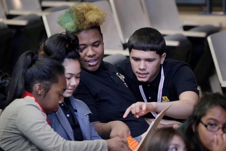 In Kensington, a fortunate son waves high-tech flag