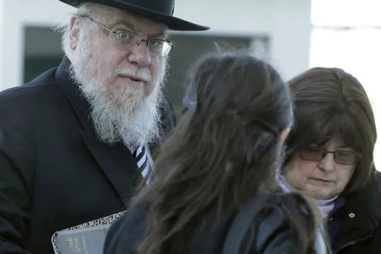 Views clash at trial of rabbi