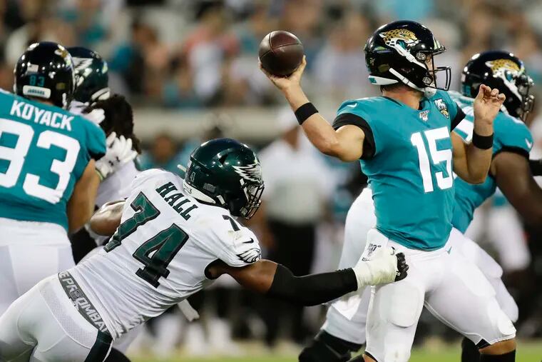 Eagles final defensive end spot down to Daeshon Hall, Shareef Miller ...