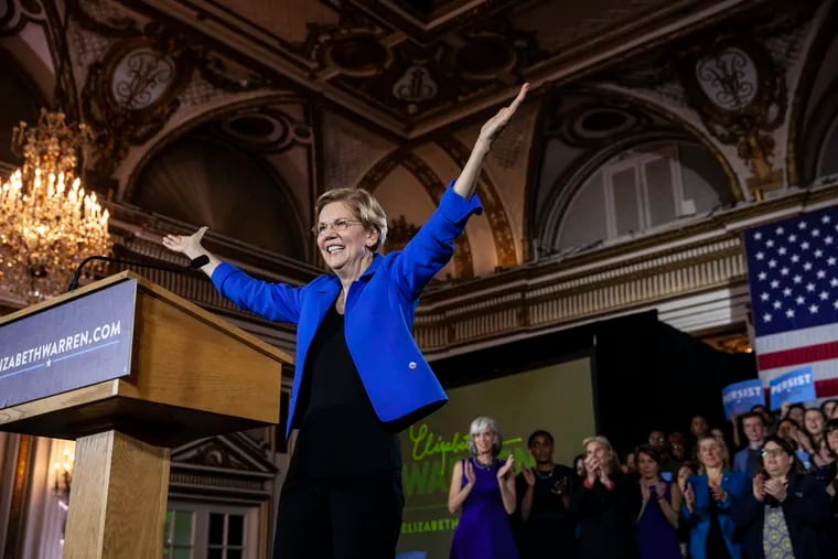 Warren apologizes for calling herself Native American