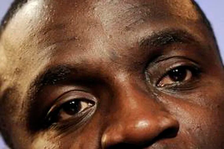 Akon edges away from criminal image