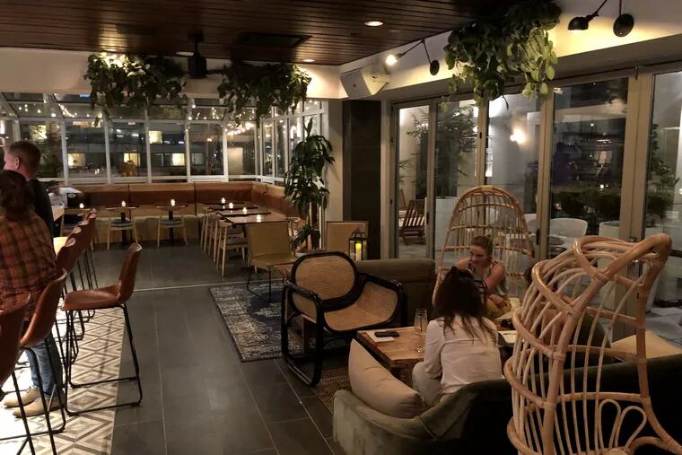 Attico, a cocktail bar, rises high over Broad Street