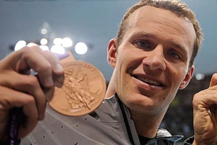 Hansen completes comeback with 100 breastroke bronze