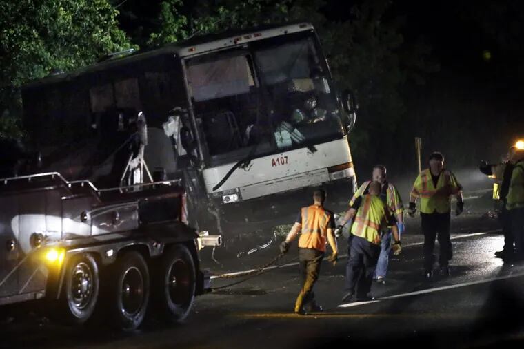 Tour bus overturns in N.J. Turnpike crash