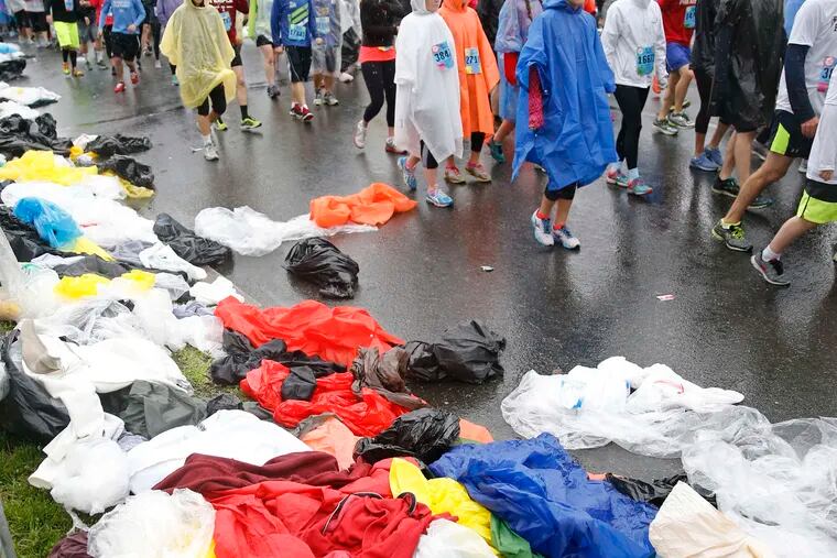 Soaked and chilled, Broad Street runners persevere