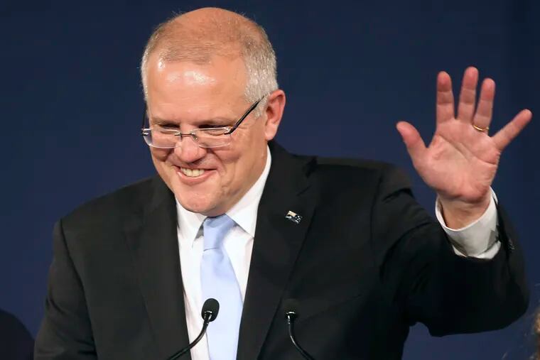Australia’s leader vows to get back to work after shock win
