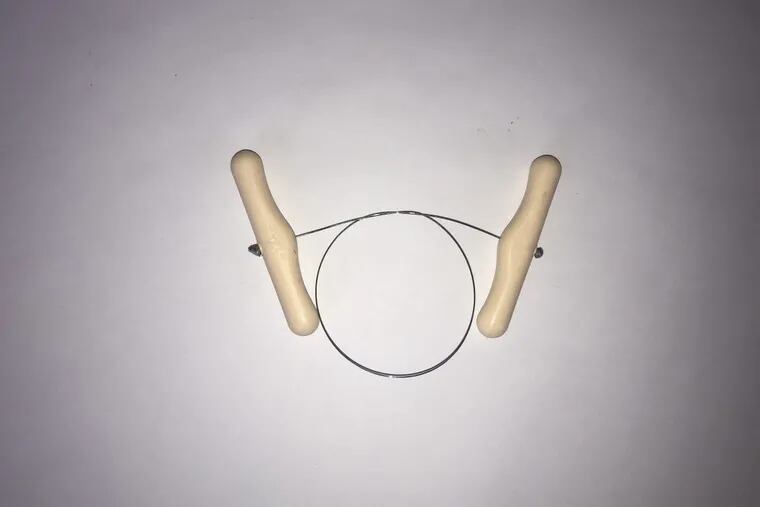 With a wire, soft cheese turns into neat slices