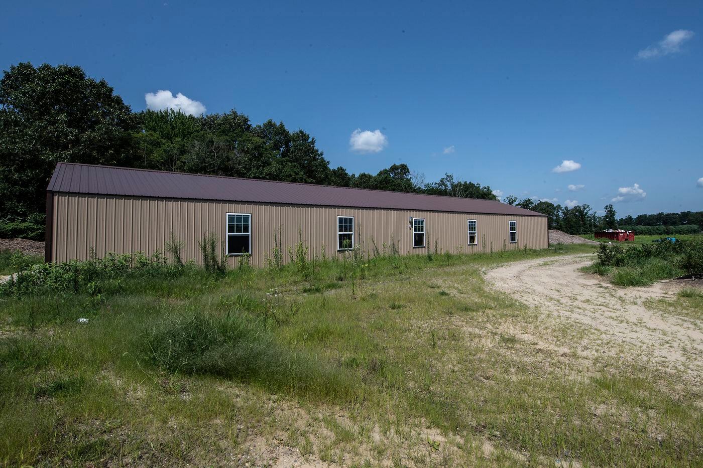 N.J. blueberry farms house workers in storage sheds, pollute groundwater