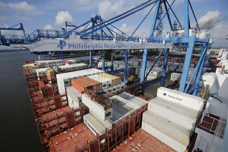 Shipping container falls on truck at port, killing worker