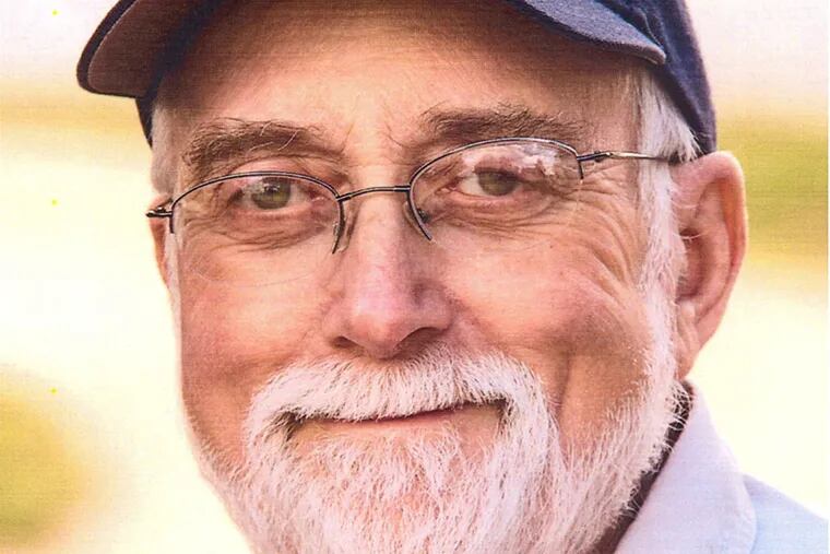 Carl A. Breitinger, 71, photojournalist