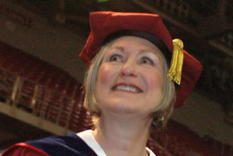 Temple installs its 1st female president