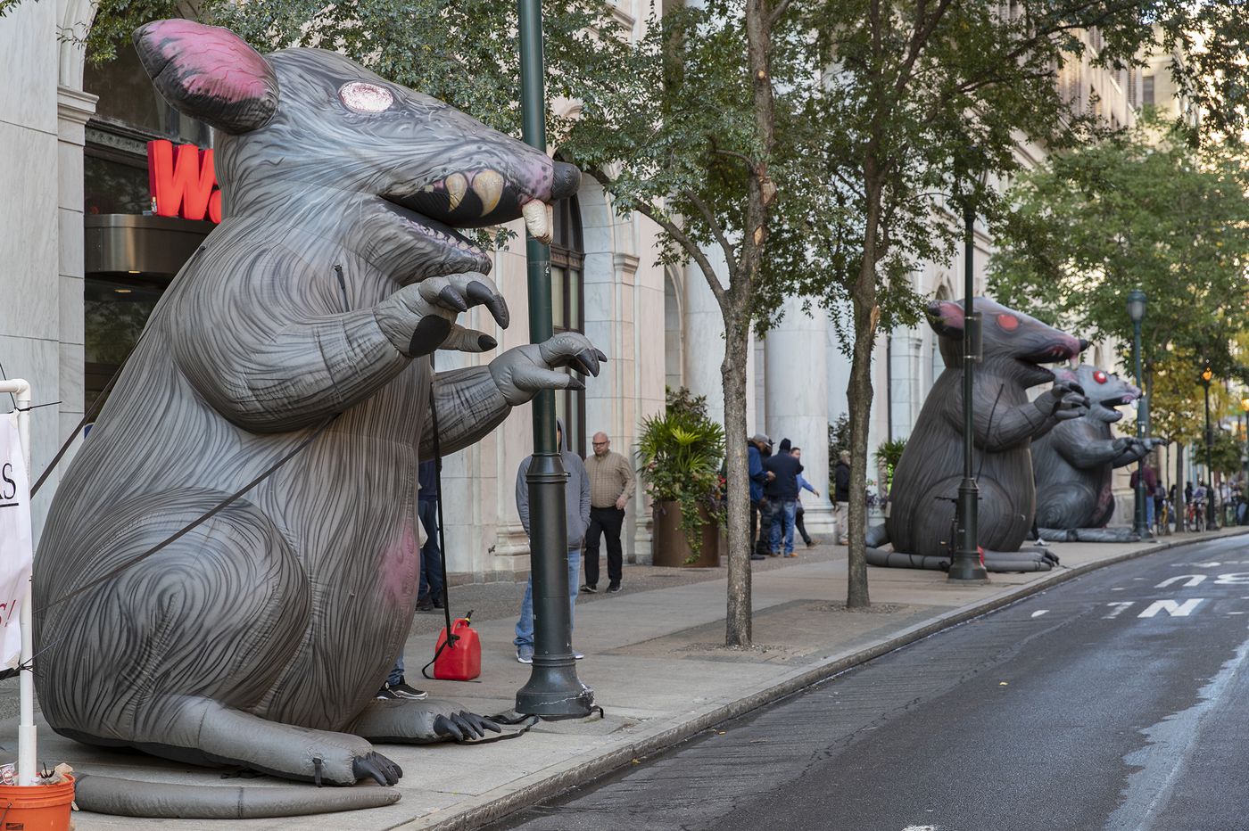 Seven ‘Scabby the Rats’ line Public Ledger Building as unions protest