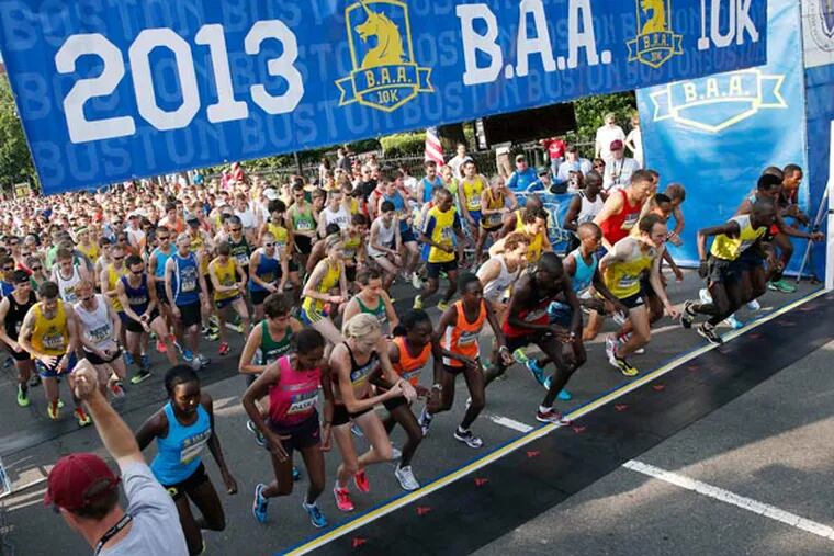 Winning gesture at 10K race in Beantown