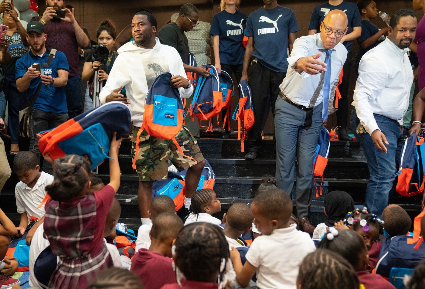 Meek Mill donates 6,000 backpacks to Philly school kids at his alma mater